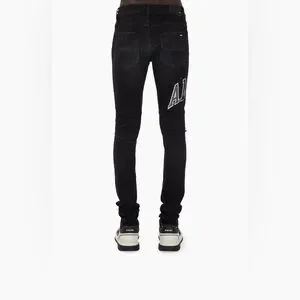 AMIRI | Jeans | Varsity Logo Repair Skinny Jeans | Poshmark